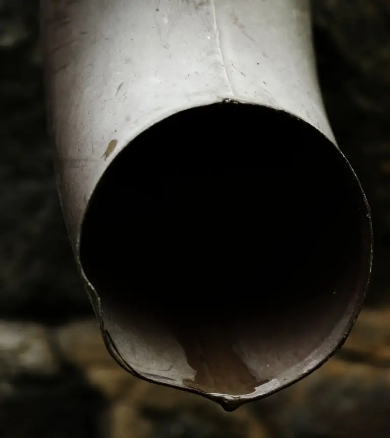 Pros And Cons Of A Rock Downspout Catch Basin Under Gutters ...